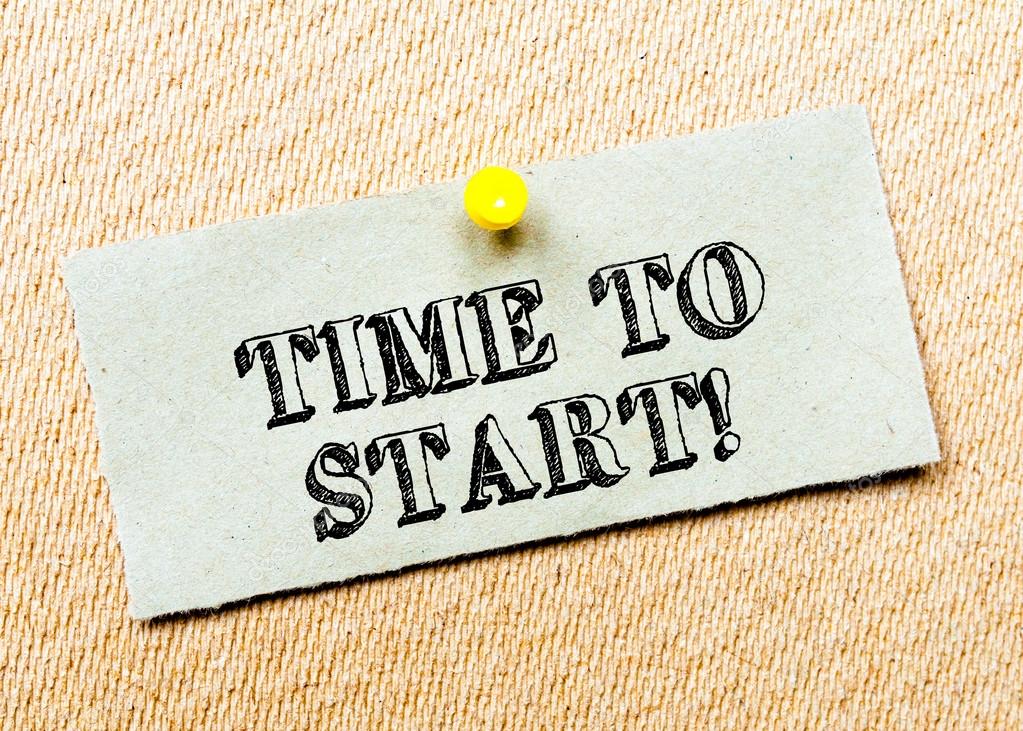 Recycled paper note pinned on cork board. Time to Start message ...