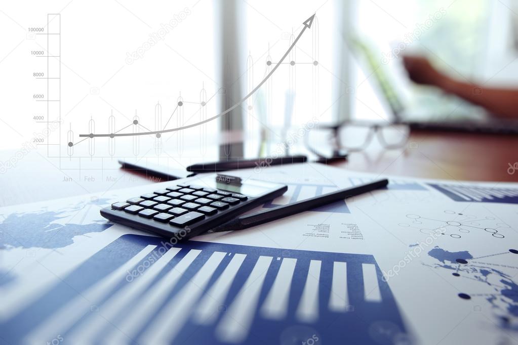 Business documents on office table with digital tablet and man w Stock ...