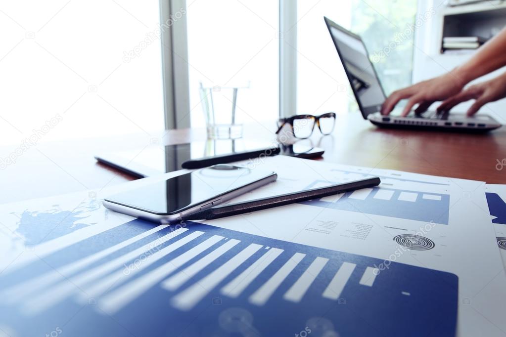 Business documents on office table with smart phone and digital — Stock ...