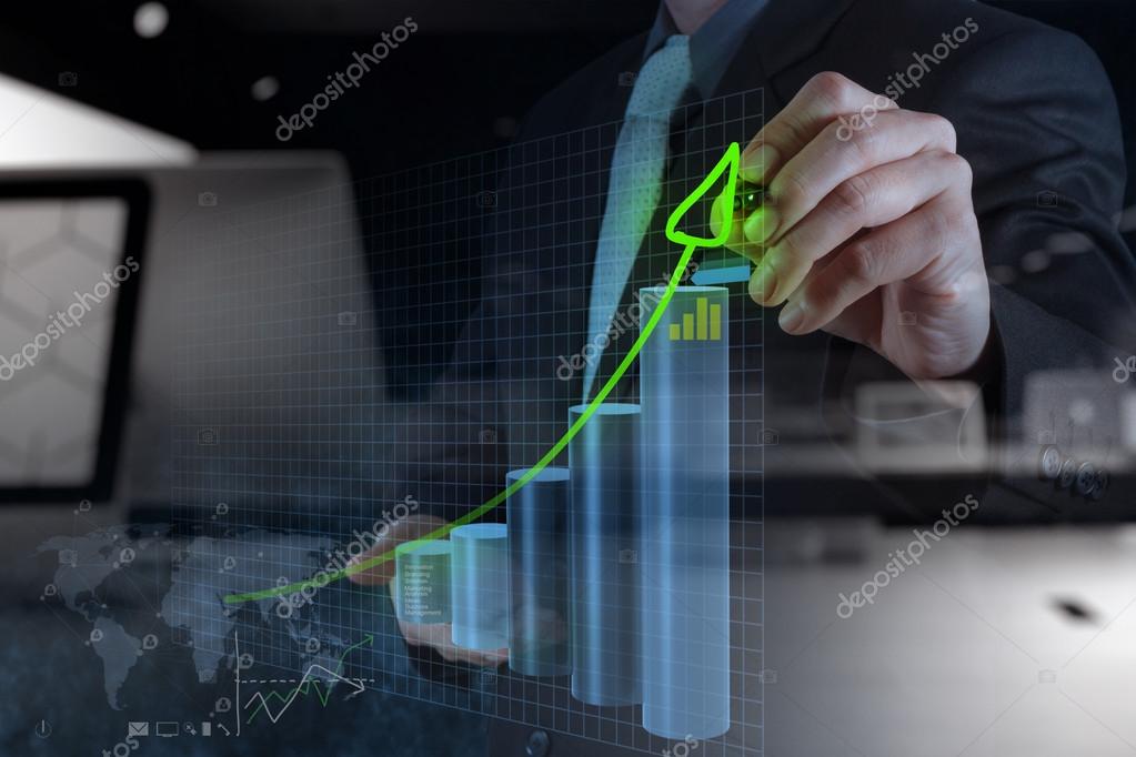 Businessman hand working with new modern computer and business s Stock ...