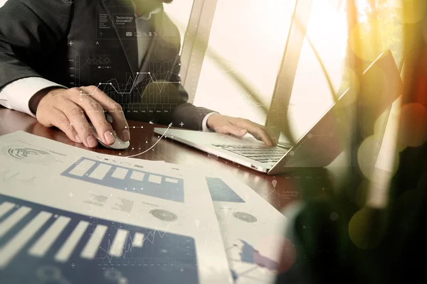 businessman hand working with new modern computer and business s ...