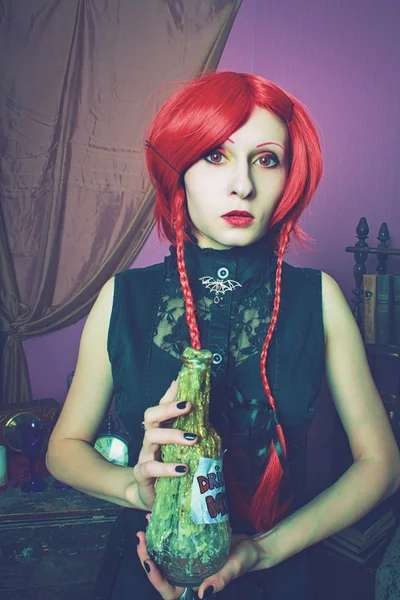 Imágenes de Steampunk female alchemist with long curly red hair making ...