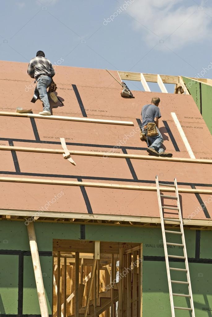 Roofers Constructing New Home — Stock Photo © whitestar1955 #55686571