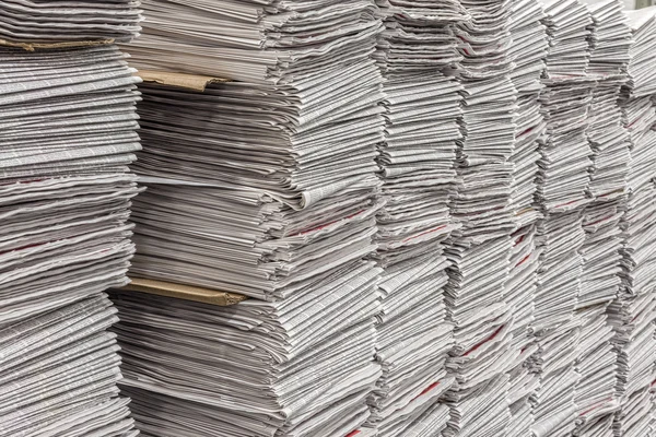 Tall Stack Of Newspapers