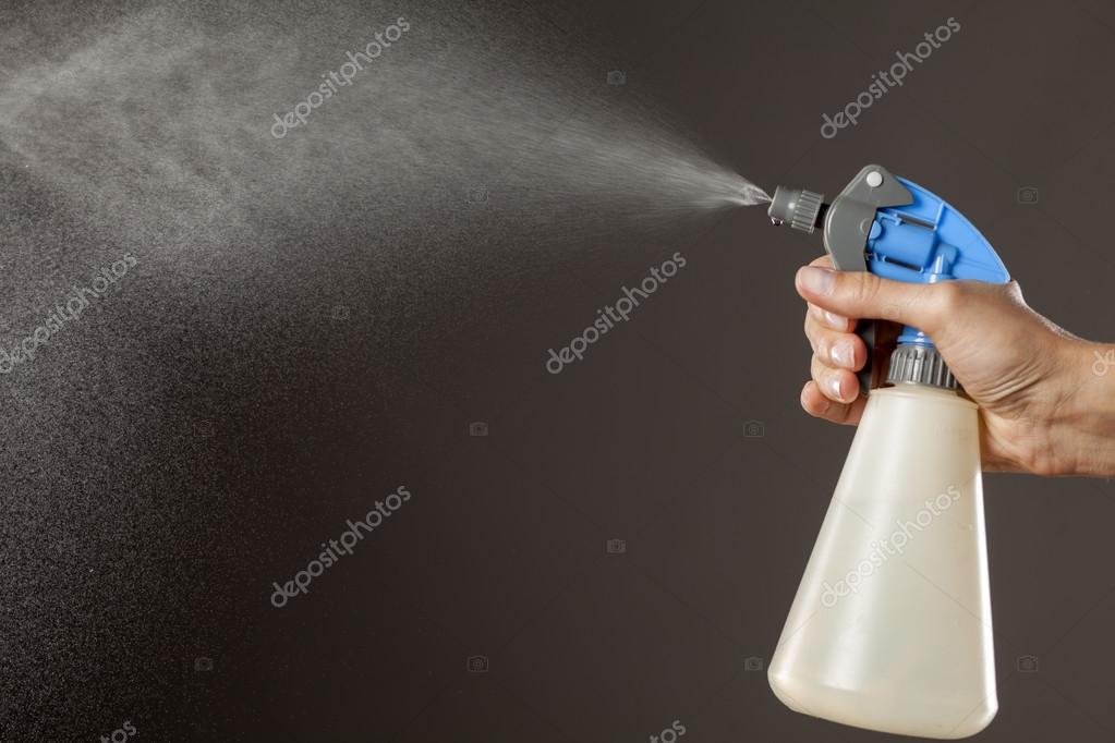 Liquid spraying bottle — Stock Photo © VGeorgiev #100899252