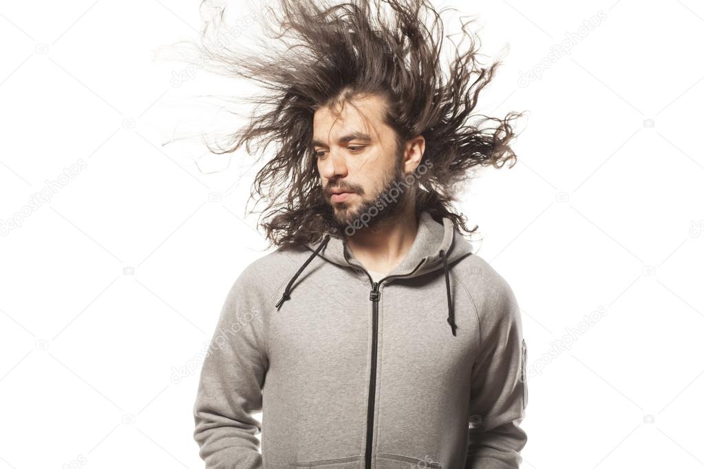 Man with beard and windy hair Stock Photo by ©VGeorgiev 74405105