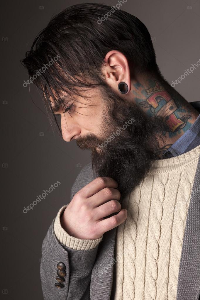 Man With Beard And Tattoos