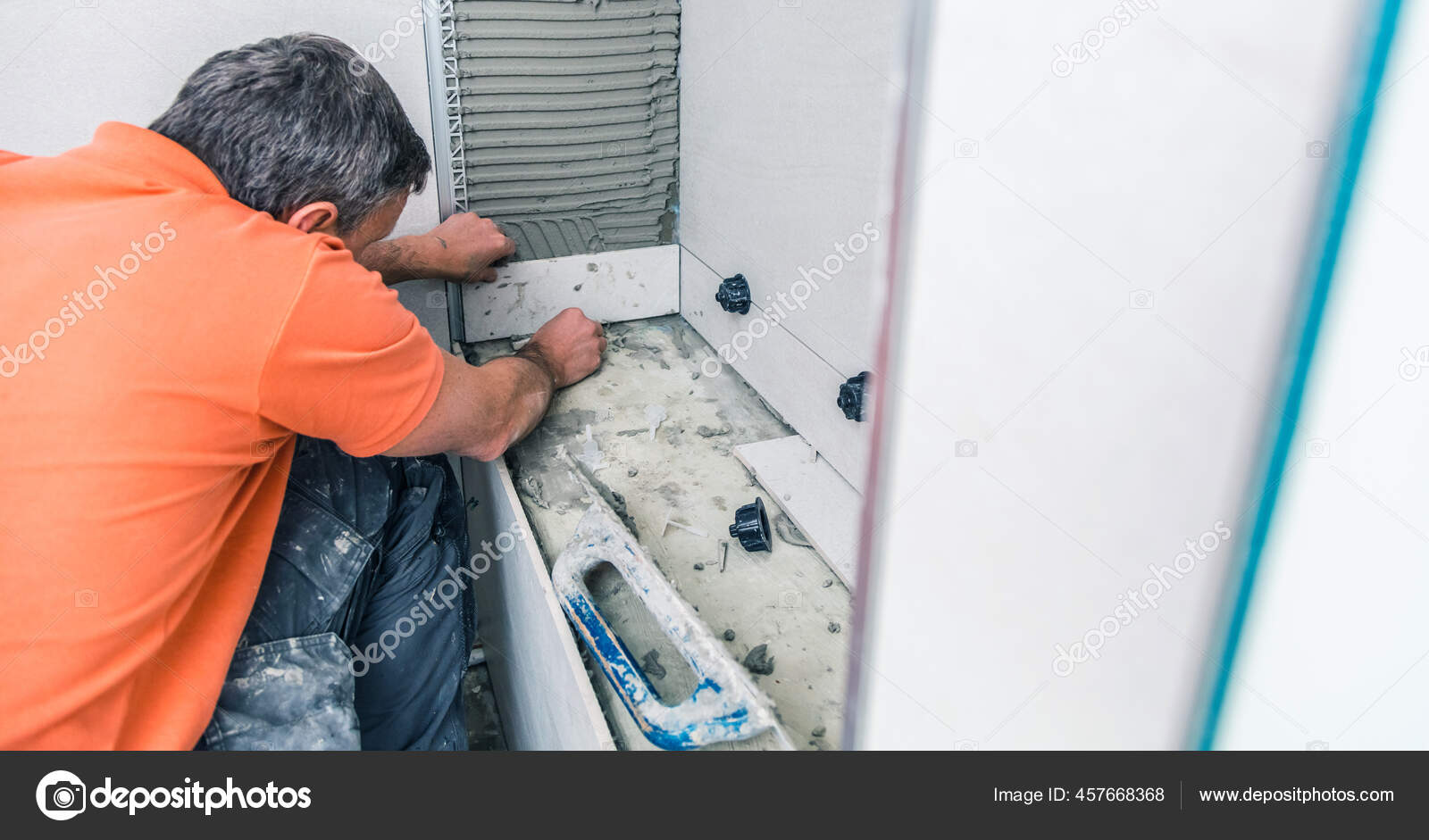 Professional Tiler Installing Large Format Tiles Wall Home Indoors ...