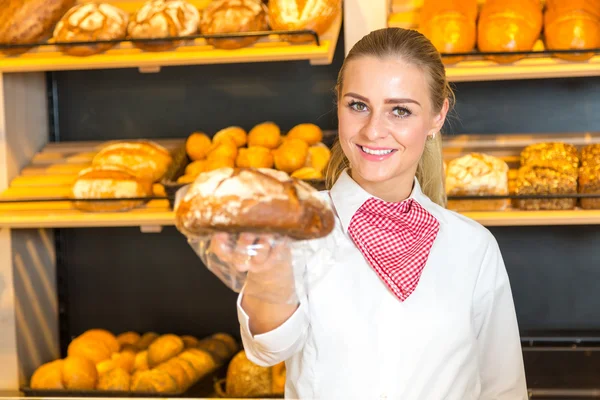 Three happy bakery workers — Stock Photo © racorn #27103573