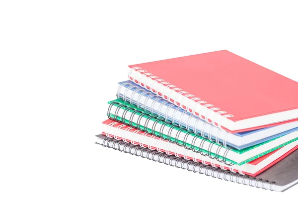 Stack of colorful spiral notebooks isolated on white Stock Photo by ... Stack of colorful spiral notebooks isolated on white Stock Photo by ...