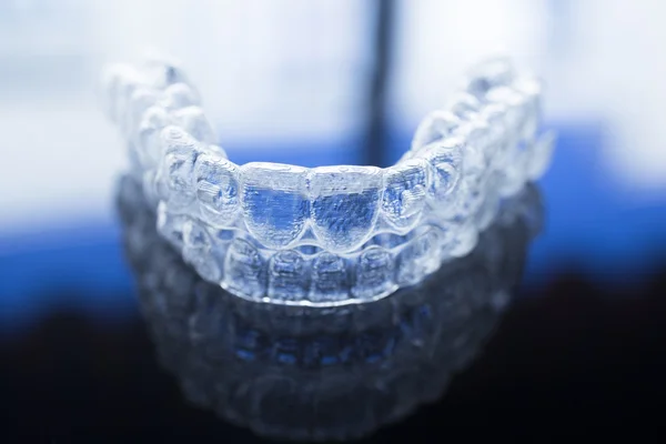 Invisible dental teeth brackets aligners braces retainers - Stock Image ...