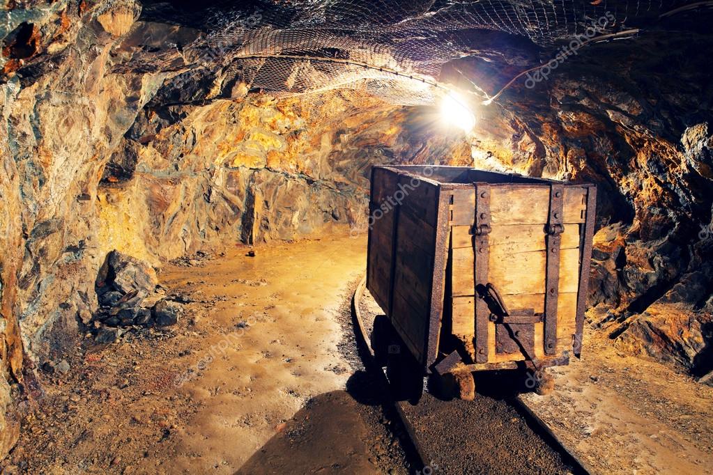 Mine gold underground tunnel railroad Stock Photo by ©TTstudio 54726261