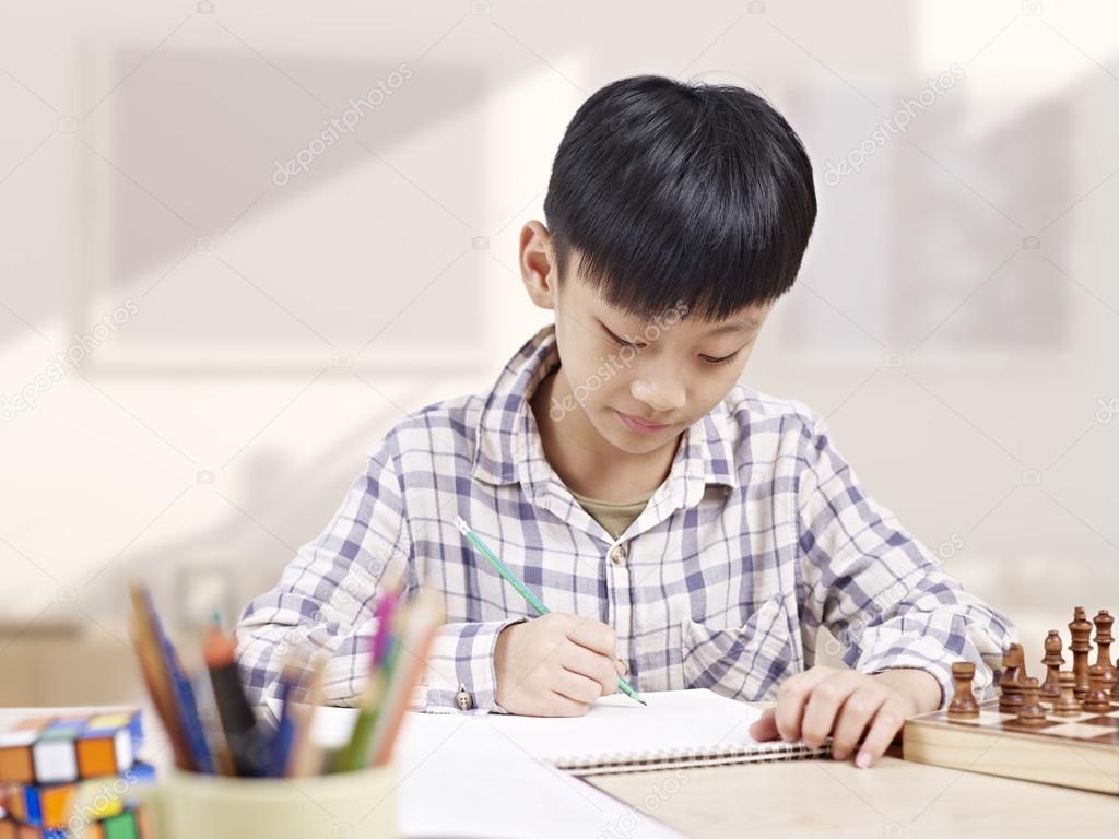 Asian child studying Stock Photo by ©imtmphoto 92922036