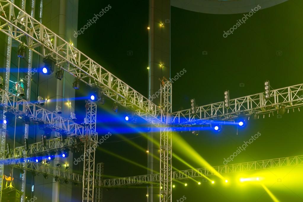 Multiple spotlights on a theatre stage lighting rig — Stock Photo © gjp1991 #74818051