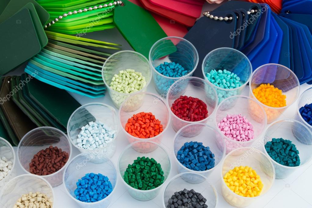 Dyed plastic polymer granulates in laboratory — Stock Photo © XXLPhoto ...