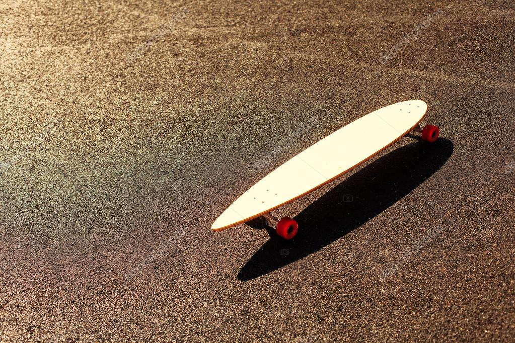 Longboard on asphalt road — Stock Photo © SolominViktor #96873634