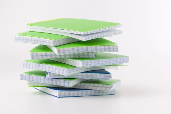 A stack of paper notebooks Stock Photos, Royalty Free A stack of paper ...