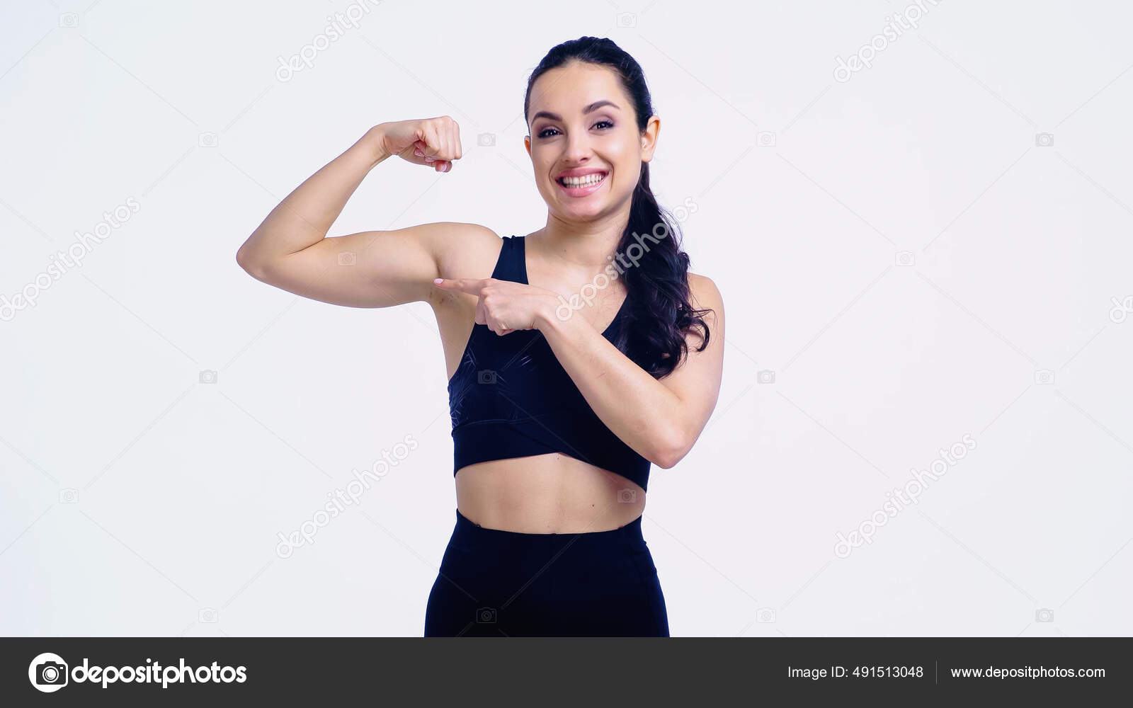 Smiling Sportswoman Pointing Muscle Isolated White — Stock Photo ...