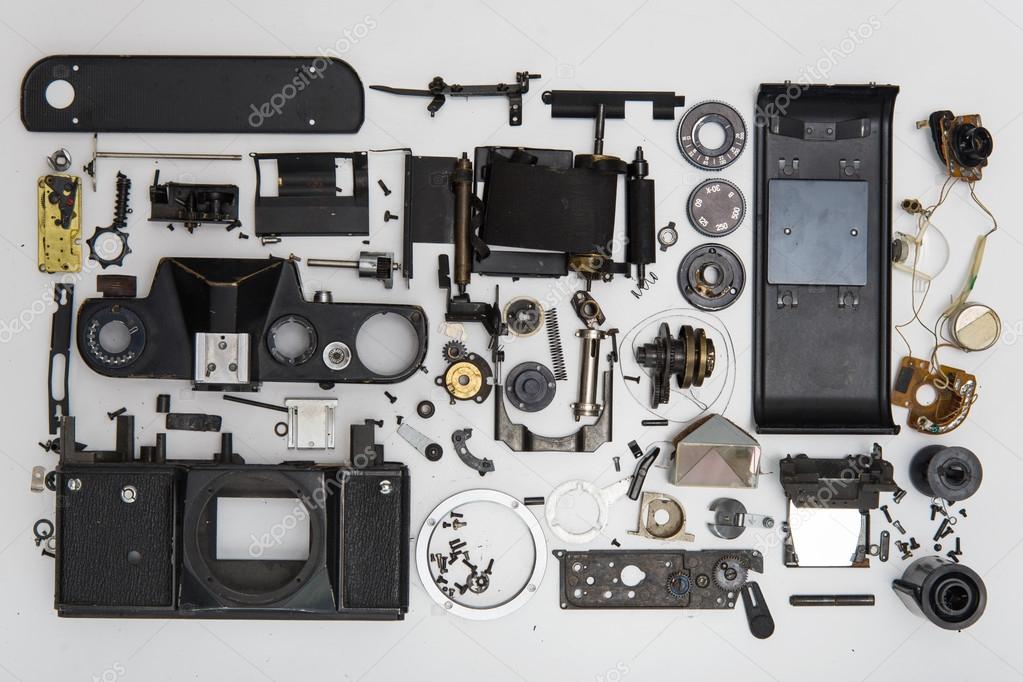 Photo camera disassembled parts — Stock Photo © unomay #92655514