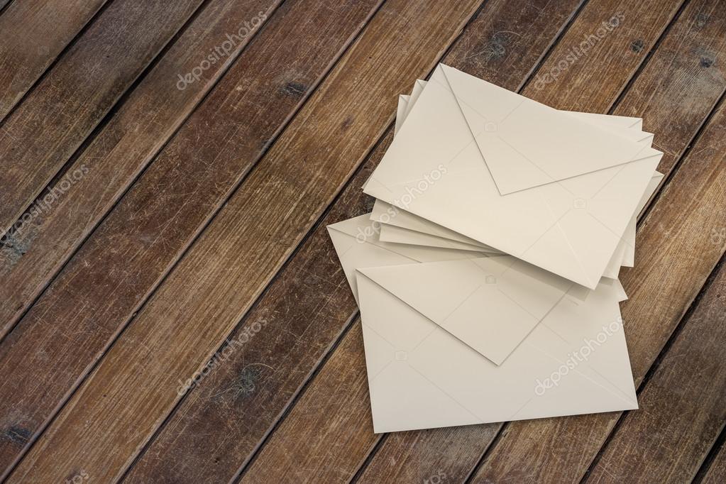 Letter envelopes for mail postage on wooden table — Stock Photo ...