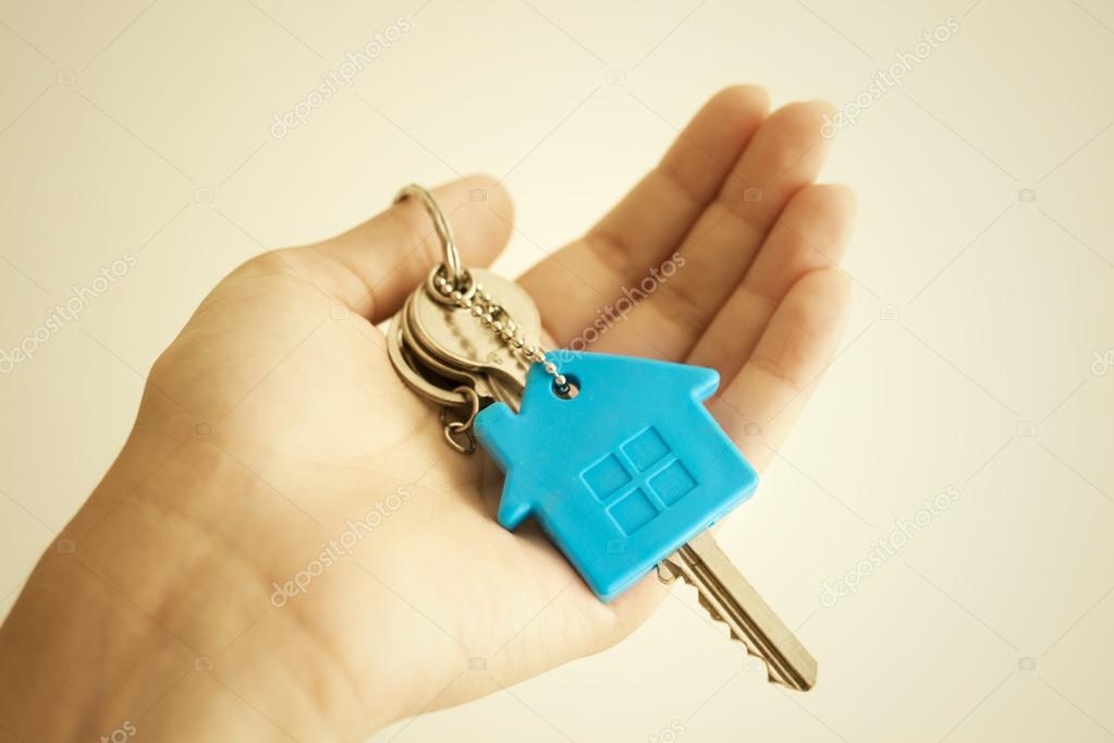 House key in hand Stock Photo by ©sonerbakir 58456175