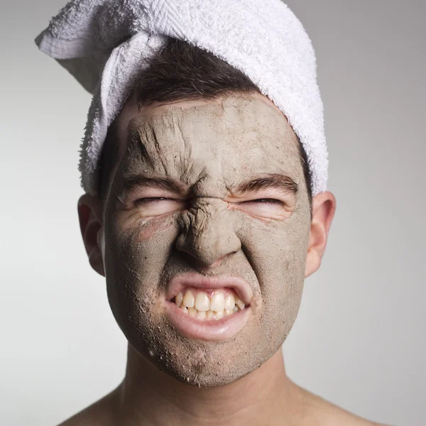 Man with a mud mask on this face Stock Photo by ©PatriciaCH 82270280