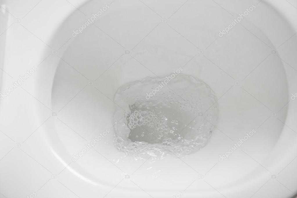 Flushing a closestool — Stock Photo © FreerLaw #67619103