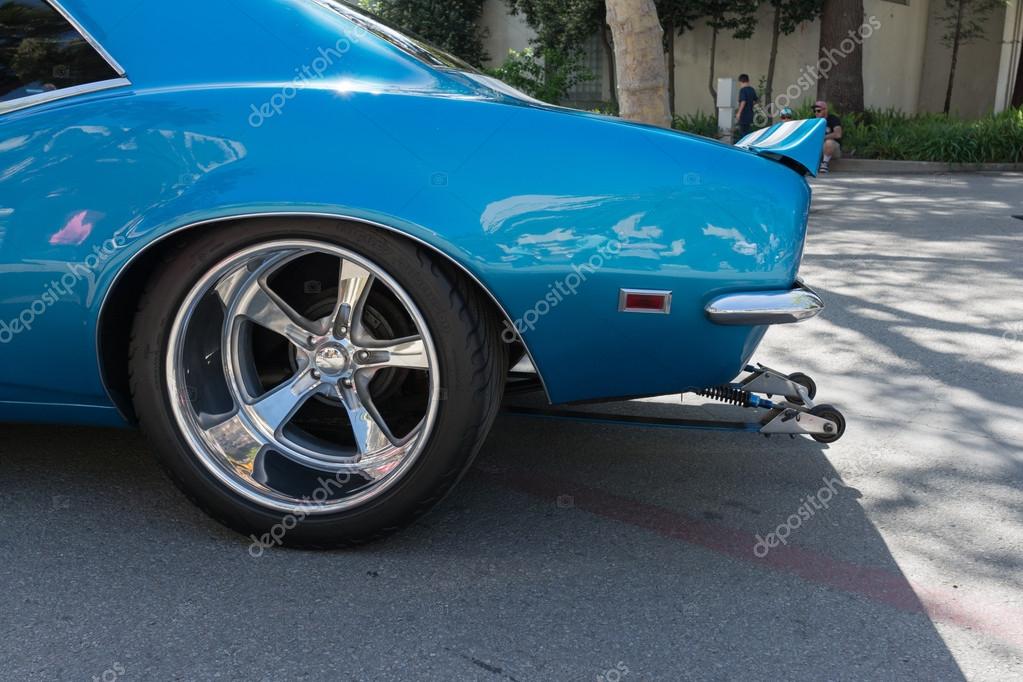 Street Machine car with competition engineering wheelie bars – Stock ...