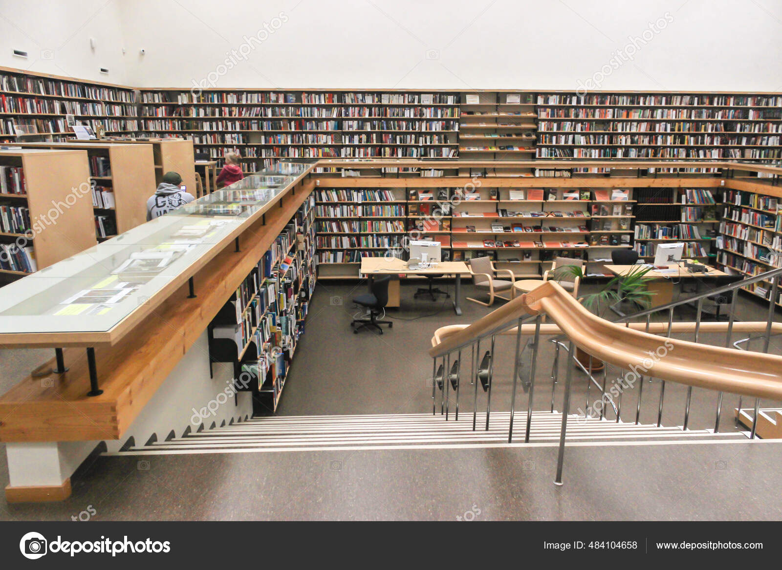Scandinavian interior in library with wooden furniture and workspace ...