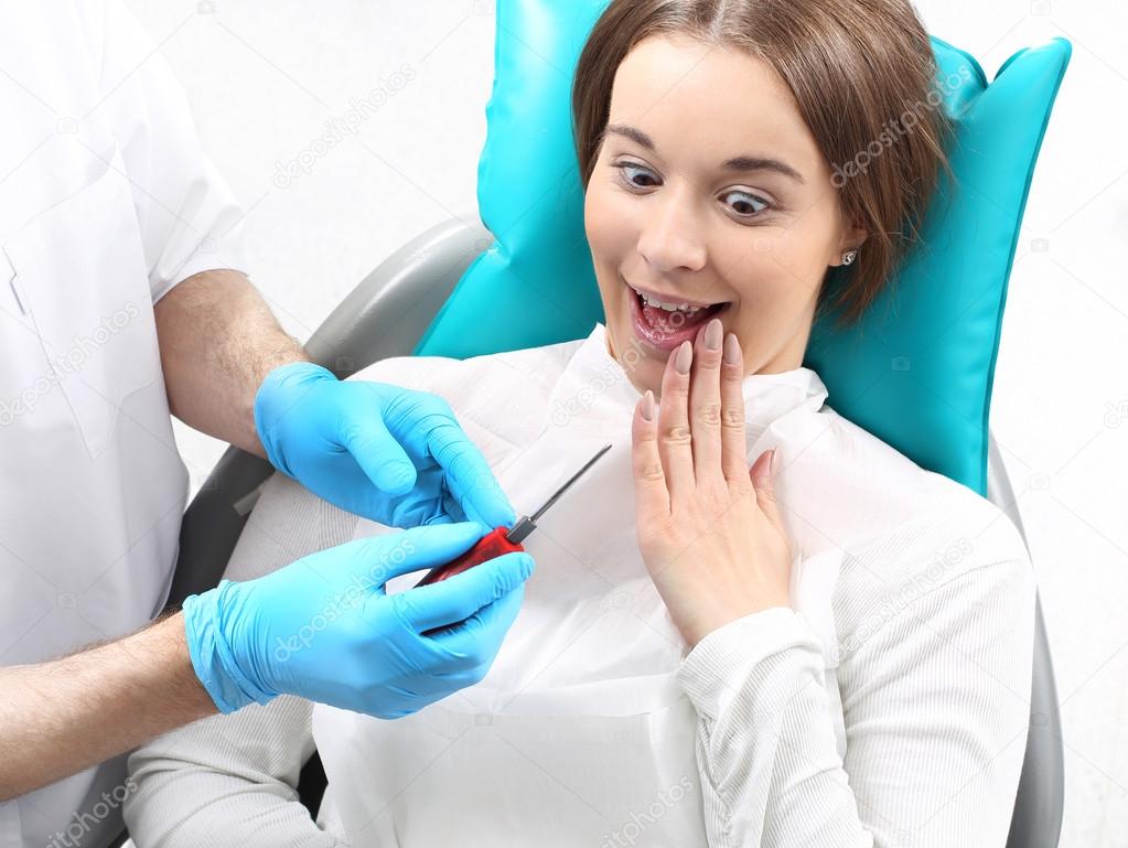Dentistry, plucking, chiselling carious tooth — Stock Photo ...