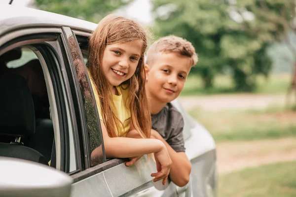 Kids in car Stock Photos, Royalty Free Kids in car Images | Depositphotos