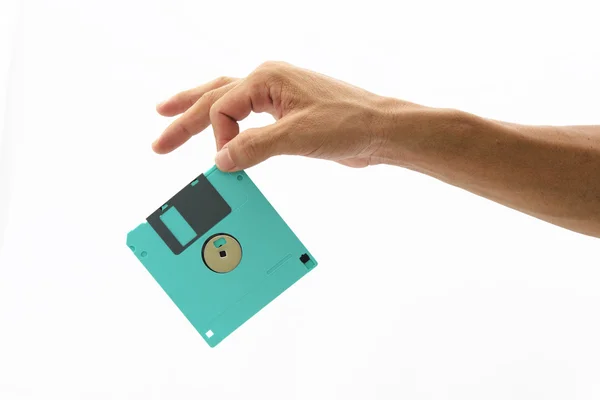 Hand with computer floppy disk isolated on white background Stock Photo ...