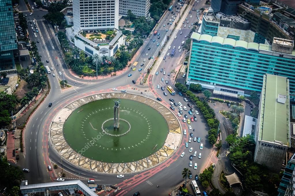 Thamrin roundabout in Jakarta — Stock Photo © photographjoe #77725966