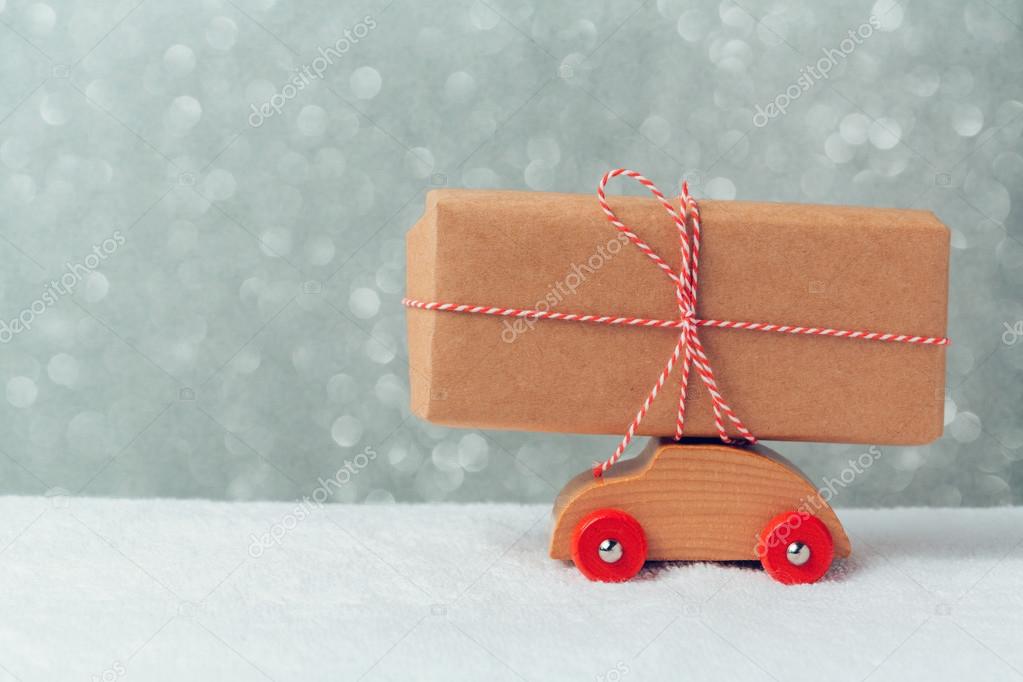 Gift box on toy car Stock Photo by ©maglara 82885638
