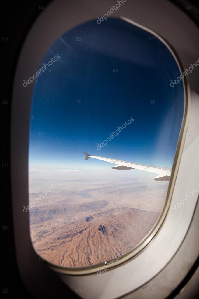 View at the earth from window of airplane — Stock Photo © MyGoodImages ...