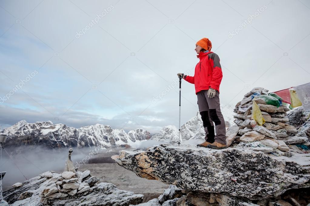 Hiker posing in Himalayas in front of big mountains Stock Photo by ...
