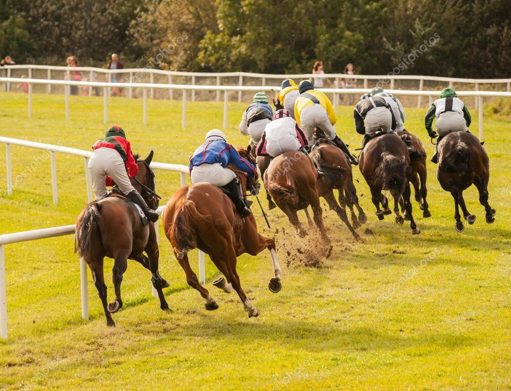 Horses racing down the track Stock Photo by ©gabriel11 54330401