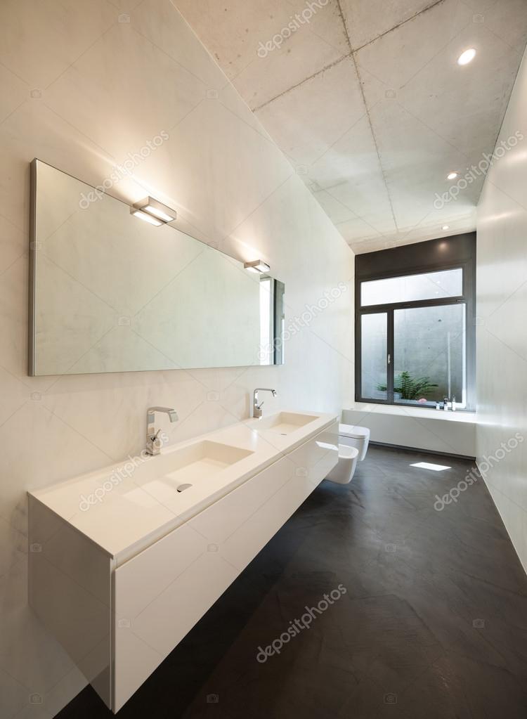 Modern bathroom with window Stock Photo by ©Zveiger 110995722