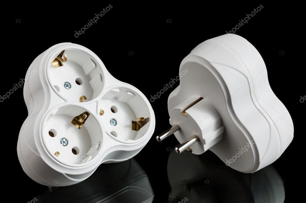 Triple electrical plug Stock Photo by ©yurazaga 103331884