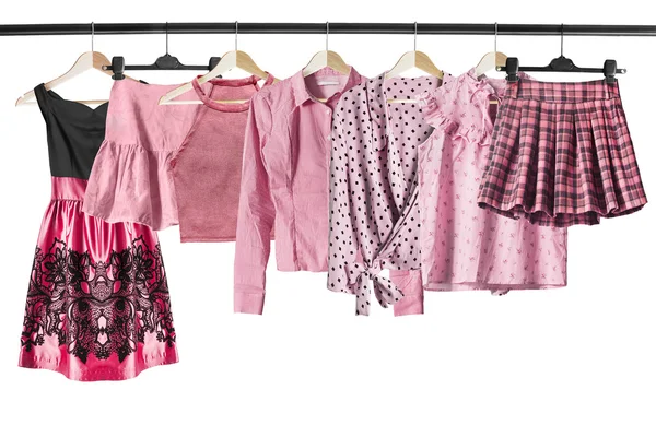 Pink clothes on clothes racks Stock Photo by ©Tarzhanova 115508146