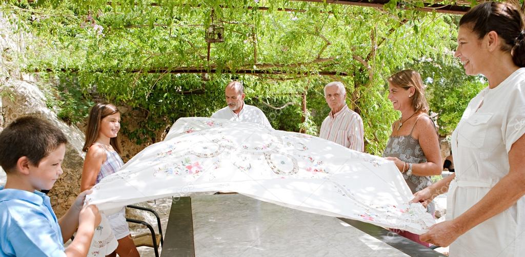 Family getting ready for eating lunch outdoors — Stock Photo © mjth ...