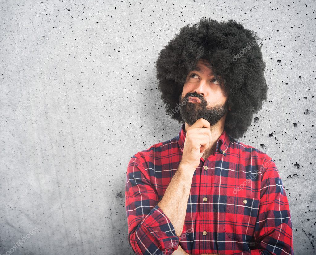 Afro man thinking over white background Stock Photo by ©luismolinero ...