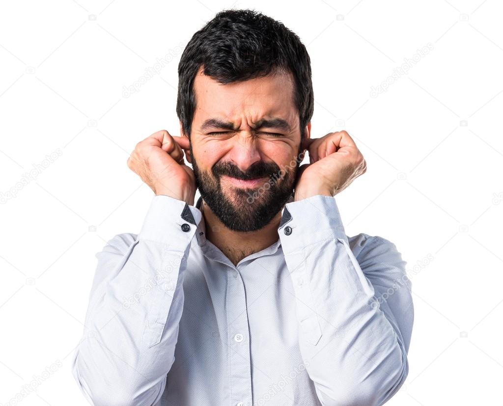 Man covering his ears — Stock Photo © luismolinero #124570130