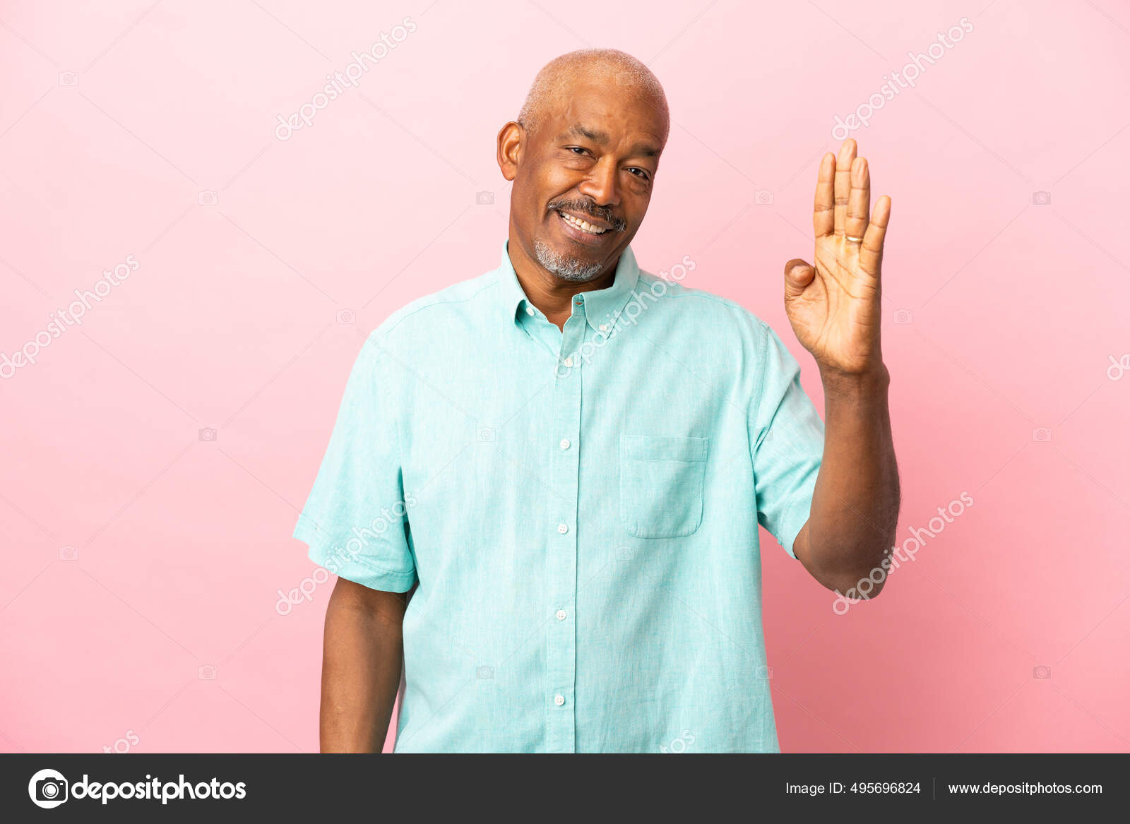 Cuban Senior Isolated Pink Background Saluting Hand Happy Expression ...