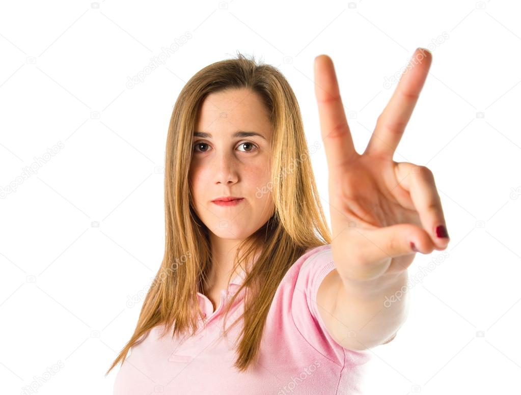 Pretty young girl winner over isolated white background Stock Photo by ...