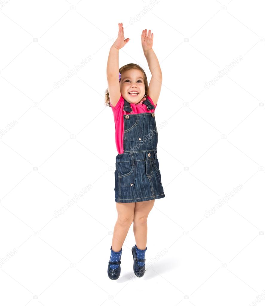 Kid jumping over isolated white background Stock Photo by ©luismolinero ...