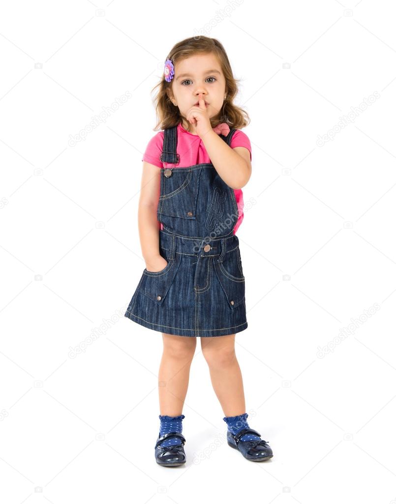 Kid making silence gesture over white background Stock Photo by ...