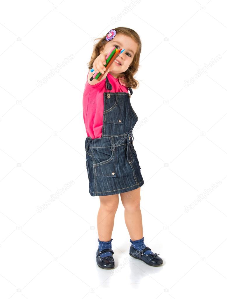 Kid holding crayons over white background Stock Photo by ©luismolinero ...