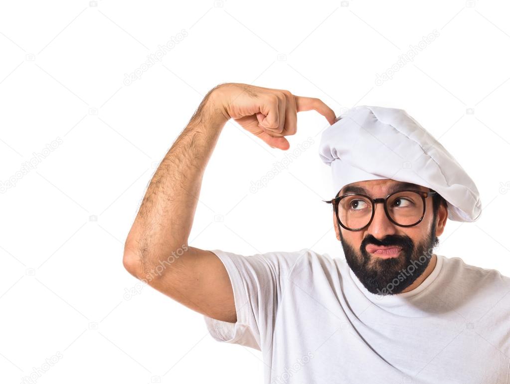 Chef thinking over white background Stock Photo by ©luismolinero 59036011