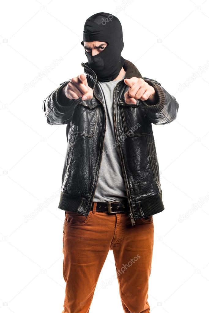 Robber pointing to the front Stock Photo by ©luismolinero 90732378
